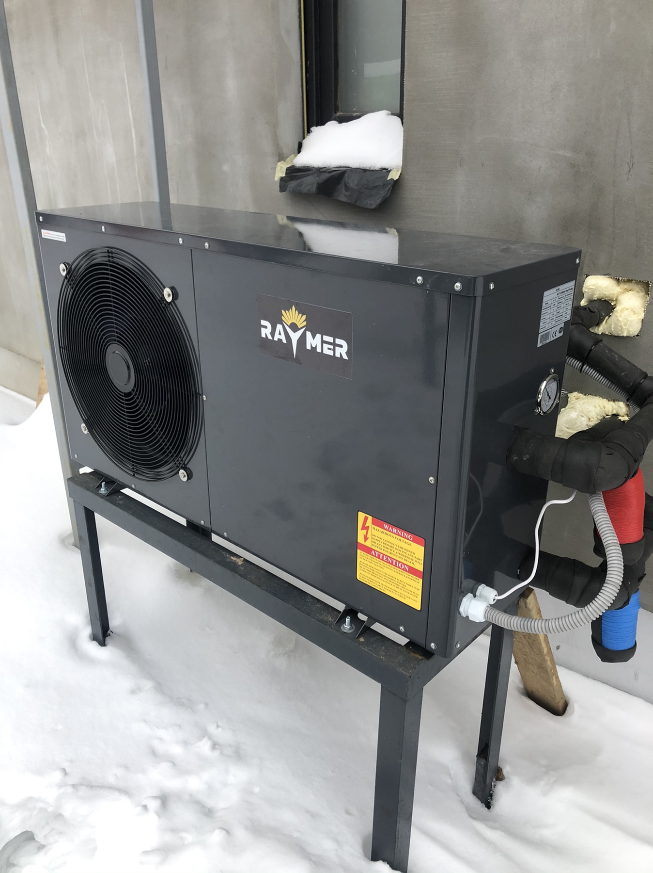 Installing a Raymer FA Heat Pump-03 11kW per 110 sq. m.